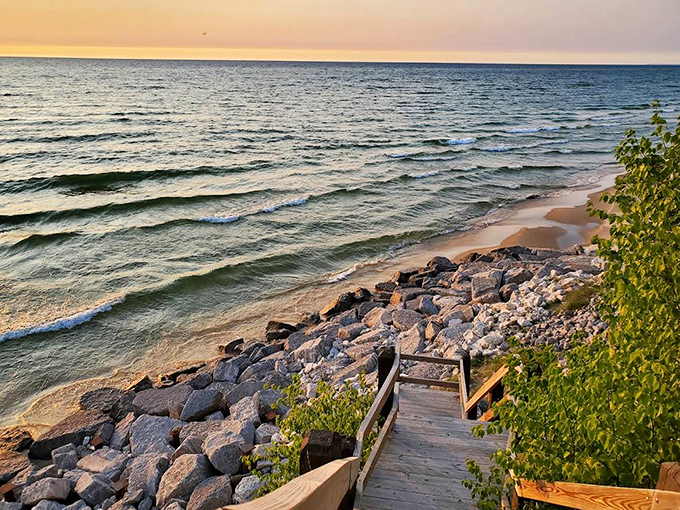Where Lake Michigan meets the sky: Orchard Beach State Park's shoreline stretches into infinity, promising adventures with every wave.