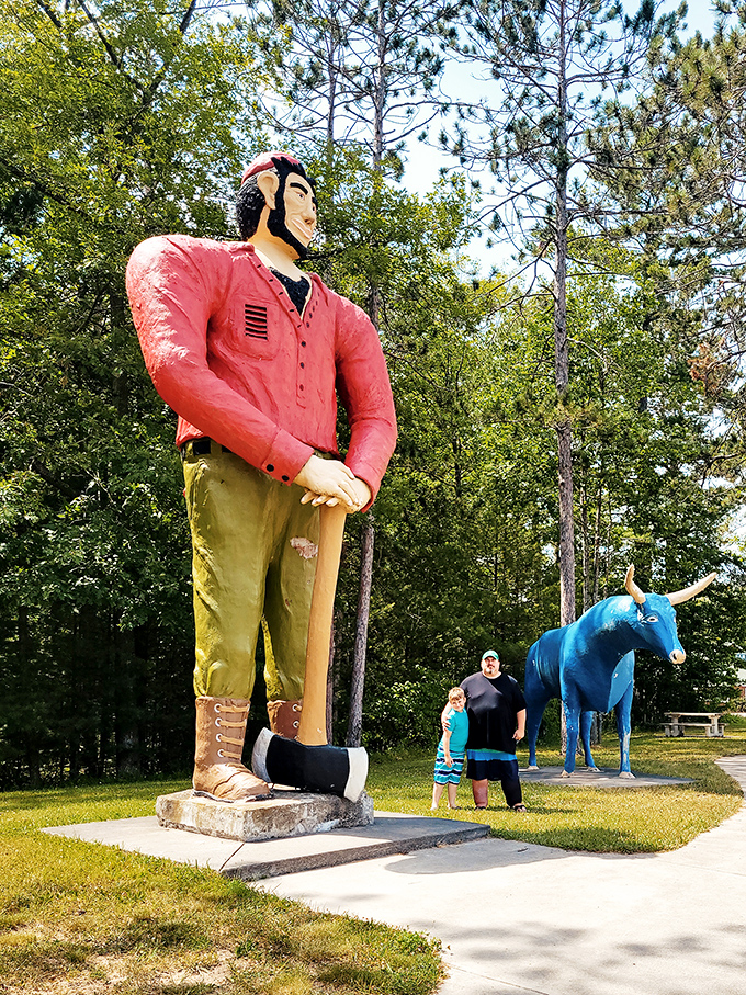 Paul Bunyan and his blue buddy Babe stand tall against Michigan's sky, welcoming travelers with their larger-than-life presence.