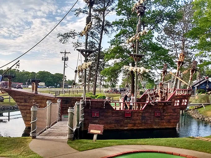 A full-sized pirate ship anchors the Brainerd adventure, beckoning travelers to abandon the highway for swashbuckling mini-golf escapades.