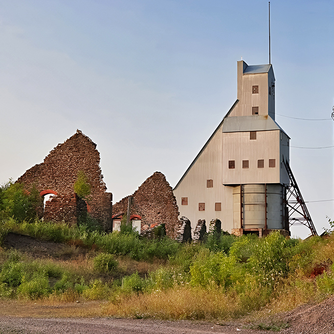 The iconic Quincy Mine shaft house stands tall against the Michigan sky, a sentinel guarding copper country's rich industrial past.