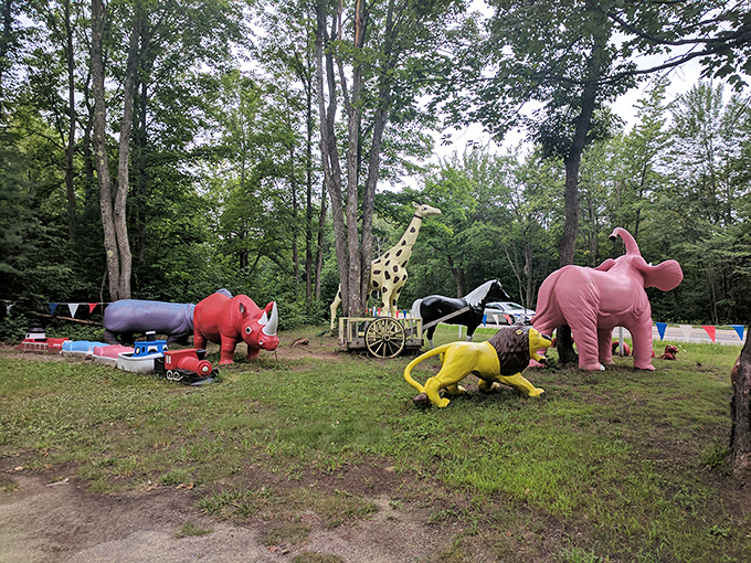 A whimsical menagerie where concrete creatures gather for what appears to be the world's most colorful safari meeting.