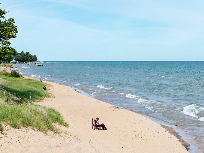 Sleeper State Park's pristine shoreline stretches like nature's welcome mat, where Lake Huron's crystal waters meet powdery sand. Paradise found!