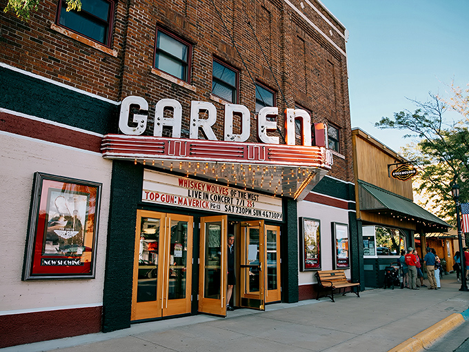 The Garden Theater's iconic marquee lights up downtown Frankfort, Michigan, promising not just a movie but a journey back to cinema's golden age.