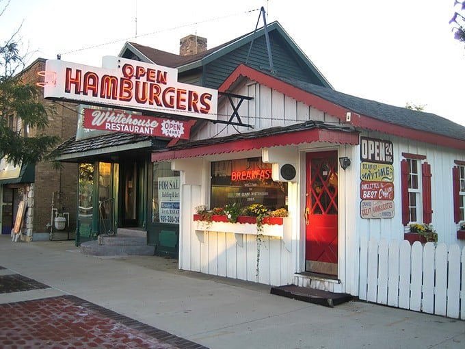 The Whitehouse Restaurant stands proudly in Clare, its vintage sign promising "OPEN HAMBURGERS" – a beacon of hope for hungry travelers seeking authentic American comfort food.
