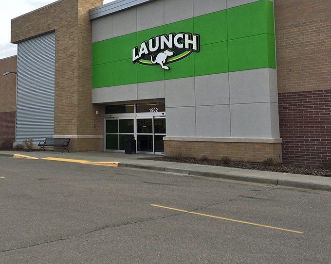 The unmistakable green signage of Launch welcomes visitors, promising gravity-defying adventures inside this unassuming exterior.