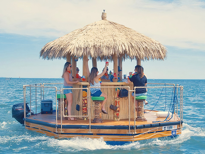That thatched roof floating on Lake Huron isn't a mirage, it's your ticket to the most delightfully absurd boat ride in Michigan, where tropical vibes meet Midwest charm.