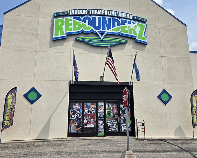 The Rebounderz exterior stands like a temple to gravity defiance, promising adventures that'll make your inner child high-five your actual children.