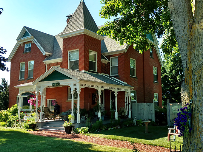 The Brickhouse of Somerset: A majestic Victorian time capsule standing proudly in brick and white trim, inviting travelers to step back into a more elegant era.