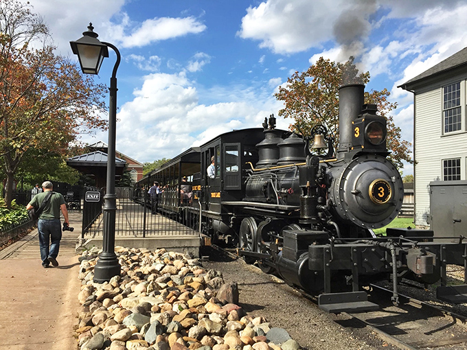 Steam power meets history as Locomotive No. 3 welcomes visitors to a journey through America's past at Greenfield Village's charming station platform.