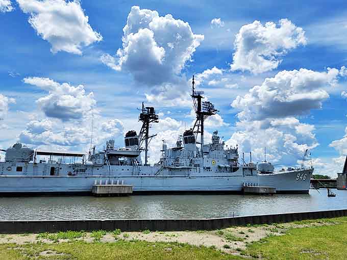The USS Edson stands sentinel on Michigan waters, its gray hull reflecting decades of naval service and perhaps a ghost story or two.