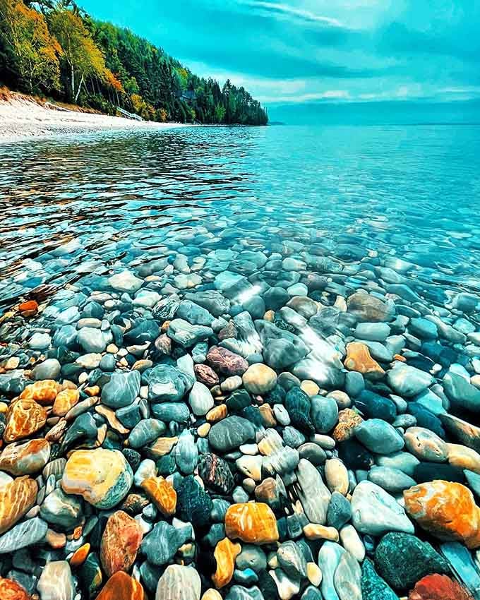 Nature's jewelry box spilled open &ndash; Van's Beach's crystal-clear waters reveal a kaleidoscope of colorful stones just waiting to be discovered.