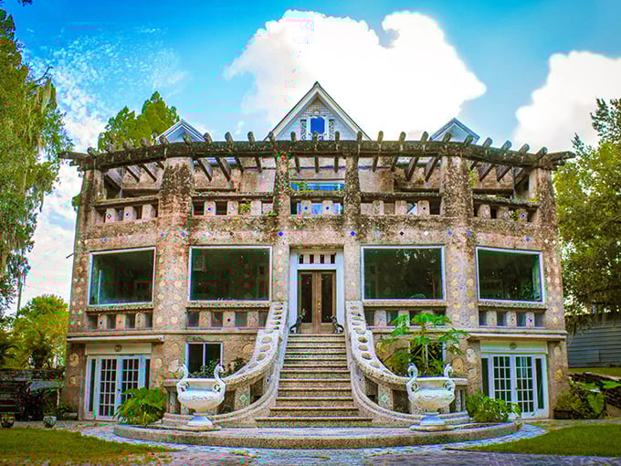 A stone palace rising from Florida's landscape like a fever dream, complete with grand staircases that secretly collect rainwater.