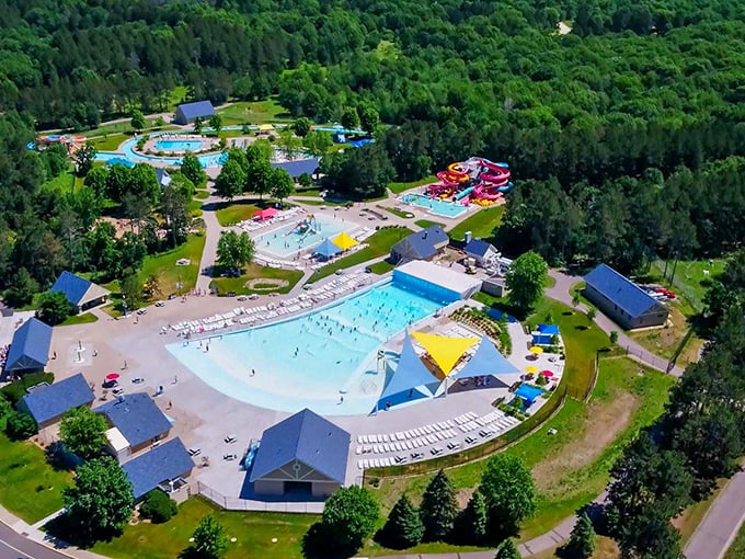 Aerial paradise: Bunker Beach Water Park sprawls across 9 acres of aquatic bliss, a blue oasis nestled among Minnesota's greenery.