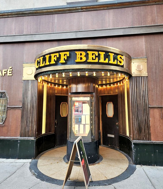 The iconic Cliff Bell's entrance stands like a time portal to the Jazz Age, its golden marquee promising vintage delights within.