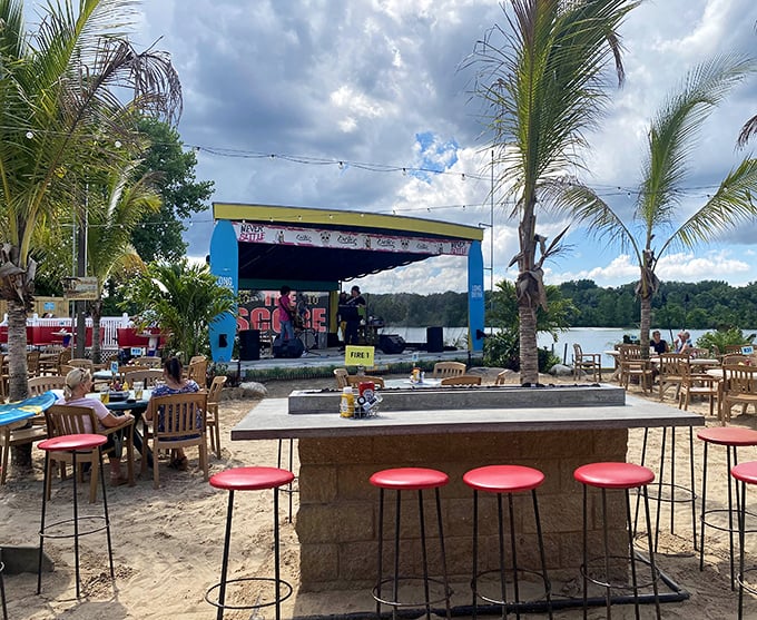 The Score's beachside stage transforms Grand Rapids into a tropical getaway, where live music and palm trees create vacation vibes without the airfare.