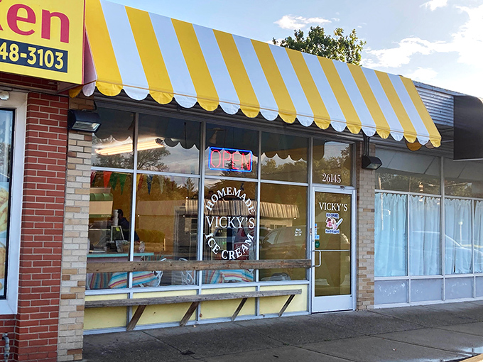 The cheerful yellow and blue striped awning of Vicky's Ice Cream stands as a beacon of sweetness in Redford Township's landscape.