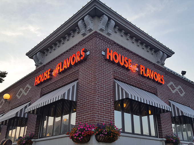 The iconic House of Flavors storefront glows like a beacon of sweetness against the Michigan sky, promising delicious nostalgia inside.