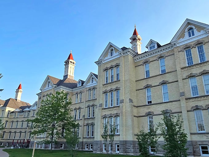 The imposing yellow-brick facade of the former Northern Michigan Asylum now houses culinary treasures instead of troubled minds.