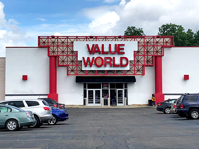 The iconic red and white Value World storefront stands like a beacon for treasure hunters, promising adventures in thrifting behind its unassuming facade.