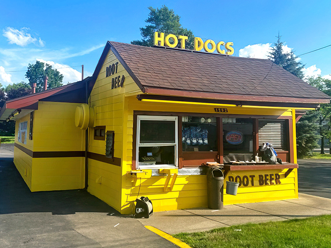 The sunshine-yellow exterior of Bill's Drive-In stands like a beacon of nostalgia, promising simple pleasures done perfectly right.