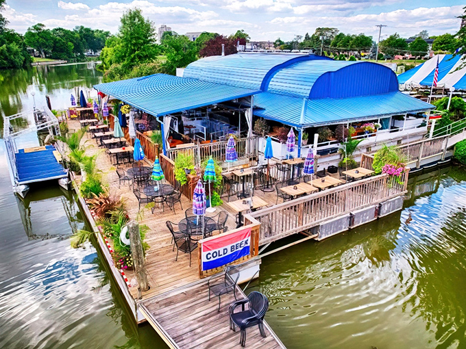 A waterfront paradise in blue, Octopus' Beer Garden stretches along the Clinton River like a tropical mirage in the heart of Michigan.