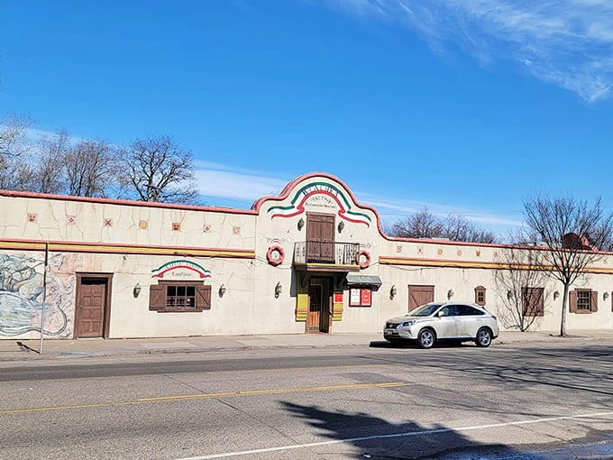 Boca Chica's charming exterior welcomes you with its distinctive arched entryway and warm cream-colored walls&mdash;a humble preview of the authentic flavors waiting inside.
