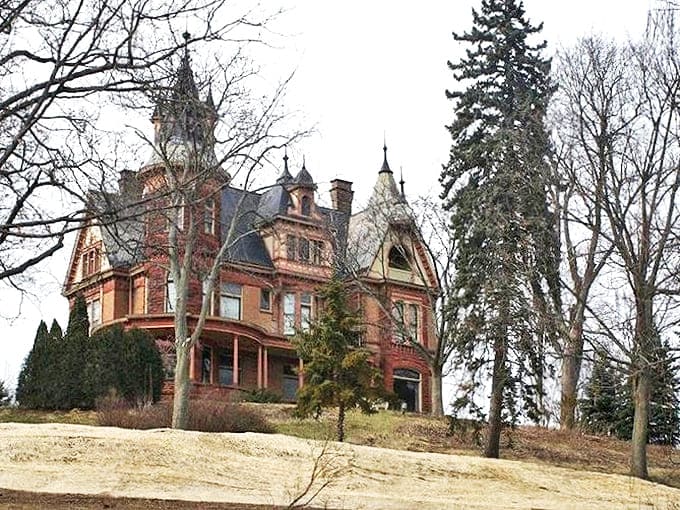 Exterior: Perched majestically on West Main Hill, Henderson Castle's Queen Anne architecture stands as a brick-and-stone testament to Gilded Age opulence.