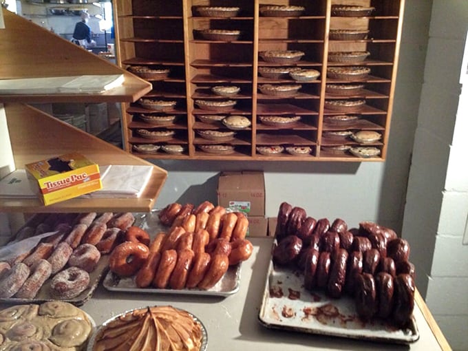 Sticky buns crowned with caramelized pecans &ndash; the kind of breakfast indulgence that makes Monday mornings bearable again.