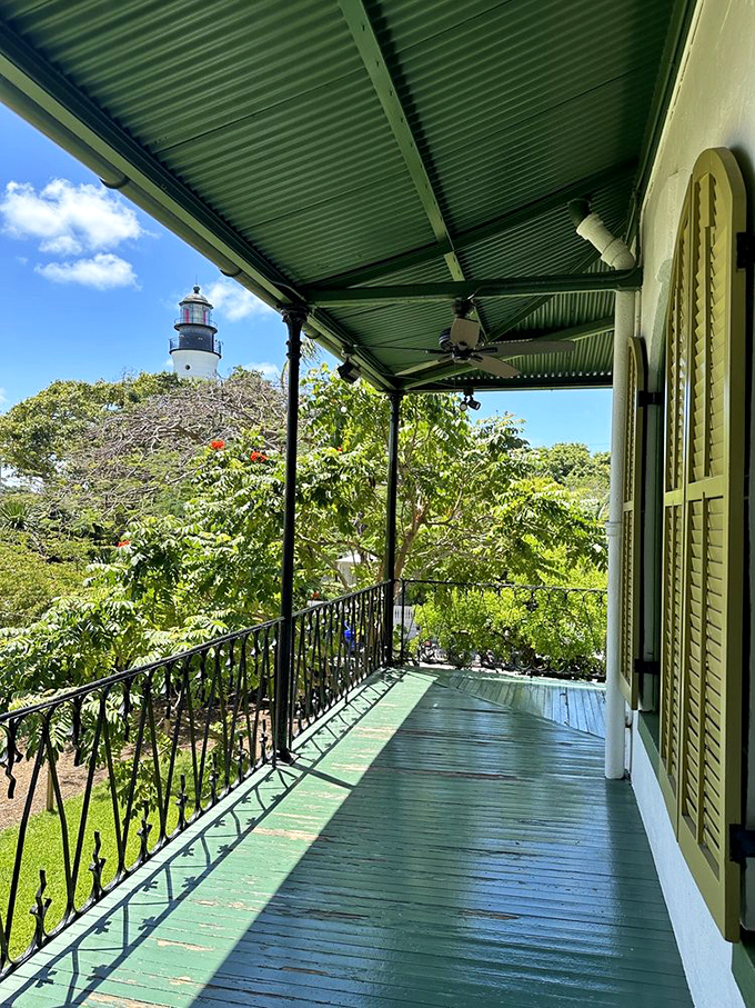 The balcony offers lighthouse views that once guided Hemingway home after long nights at Sloppy Joe's Bar.