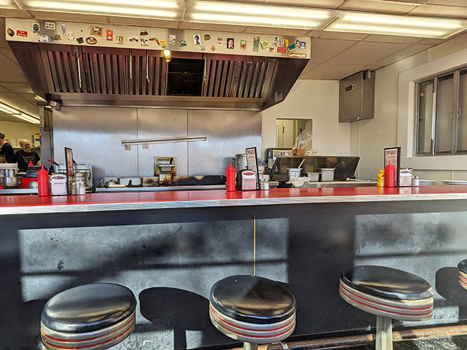 The counter isn't just for eating&mdash;it's front-row seating to the culinary theater of short-order cooking, where every movement is practiced and purposeful.