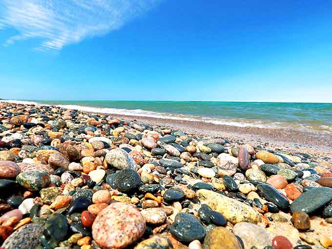 Nature's jewelry box spills open along the shoreline, each pebble a unique treasure polished by Superior's patient waters.