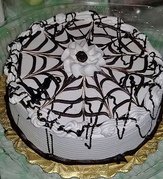 A cake so elegant it almost seems a shame to eat it... almost. Those chocolate drizzles are practically begging for a fork attack.