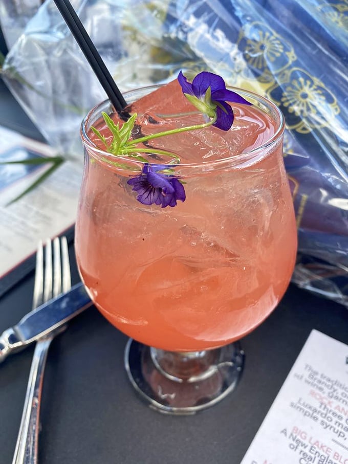 This isn't just a pretty drink, the Charleston Fizz combines fresh flavors with edible flowers for a cocktail that's as beautiful as it is refreshing.