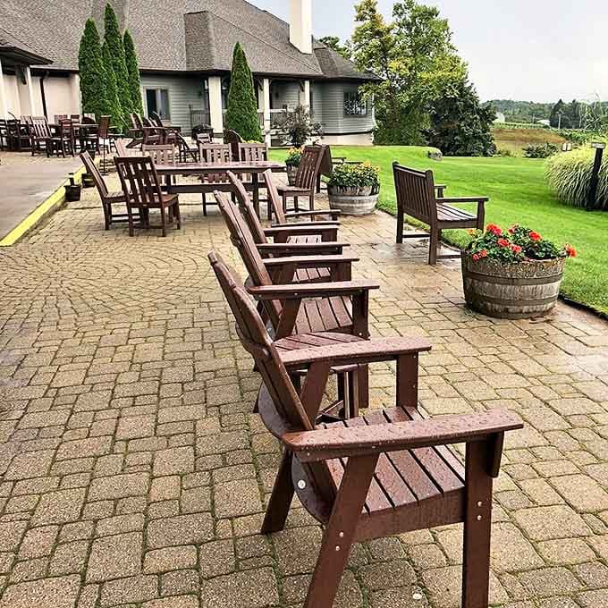 Adirondack chairs patiently wait for wine lovers to settle in for vineyard views and afternoon contemplation.