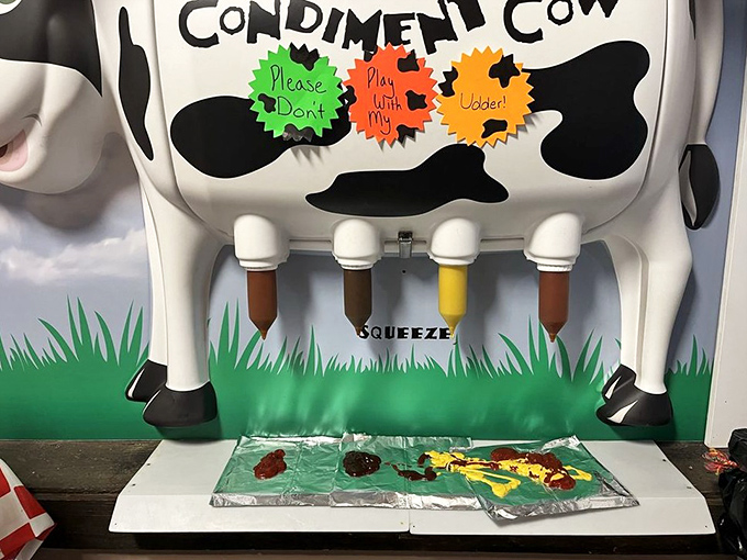 The legendary "Condiment Cow" dispenser &ndash; because squeezing ketchup from plastic udders is apparently what we all needed in our lives.