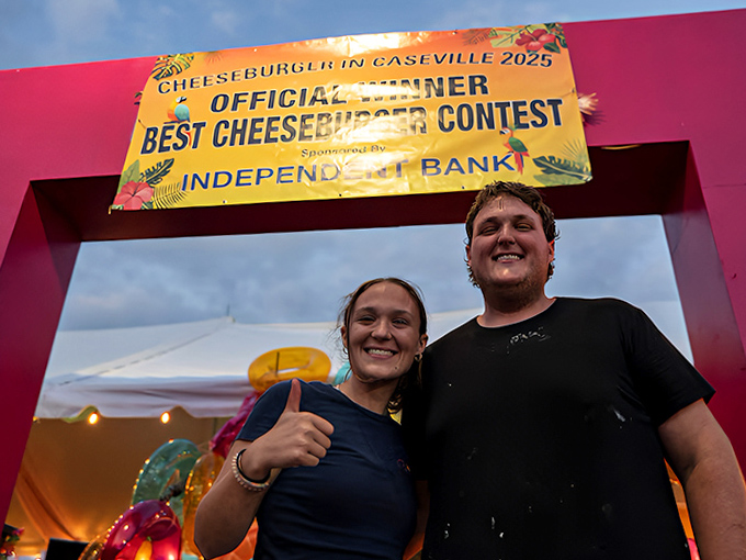 Victorious burger artisans celebrate their championship status, having conquered the competitive field of patty perfection with creative toppings.