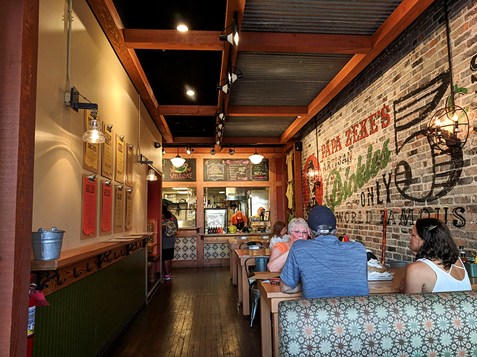 Wooden tables, metal chairs, and exposed brick create a rustic-chic atmosphere where sandwich dreams come true for lucky patrons.