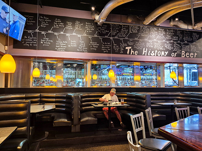 The dining area balances sports bar energy with restaurant comfort, creating a space where lingering over another round feels like the right decision.