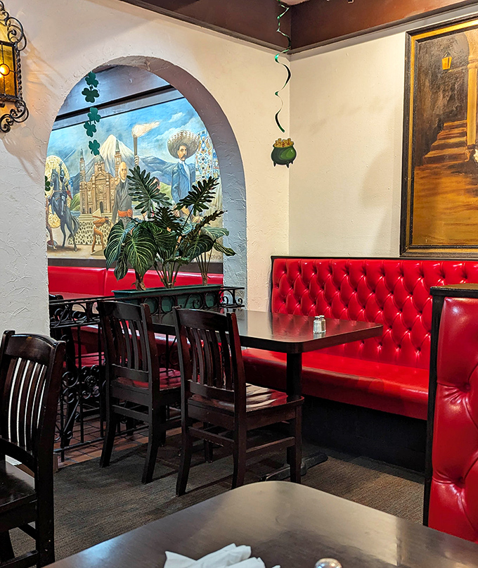 Red tufted booths and colorful murals transport diners to Mexico, creating intimate dining spaces perfect for both first dates and family gatherings.