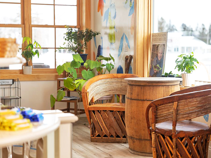 Rustic barrel tables and comfortable seating invite visitors to slow down and savor both their chocolate treasures and the moment.