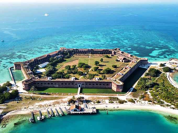 Bird's eye perfection: The hexagonal fort surrounded by a moat of natural turquoise. Engineering marvel meets geographic wonder in perfect harmony.