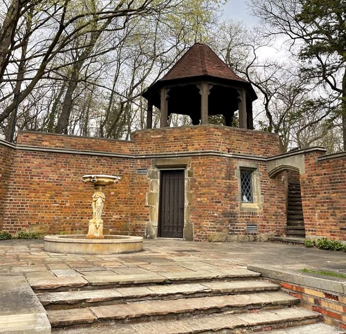 Garden walls and structures create intimate outdoor rooms, proving that even the shrubbery at Meadow Brook lived better than most humans of the era.