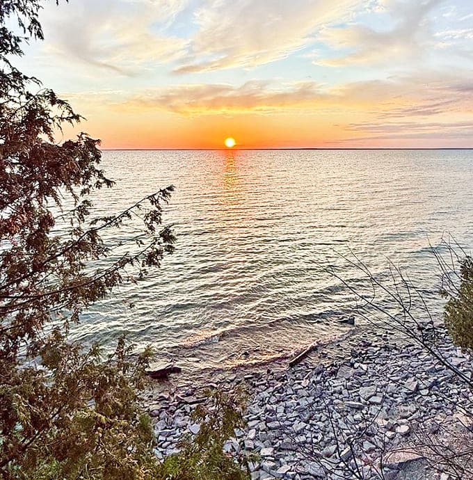 Golden hour perfection: The sun bids farewell in a spectacular display, painting the waters with liquid gold as day surrenders to dusk.