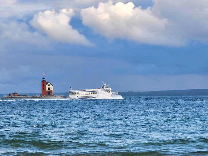 That moment when the ferry and lighthouse align perfectly &ndash; like catching two celebrities in the same frame without even trying.