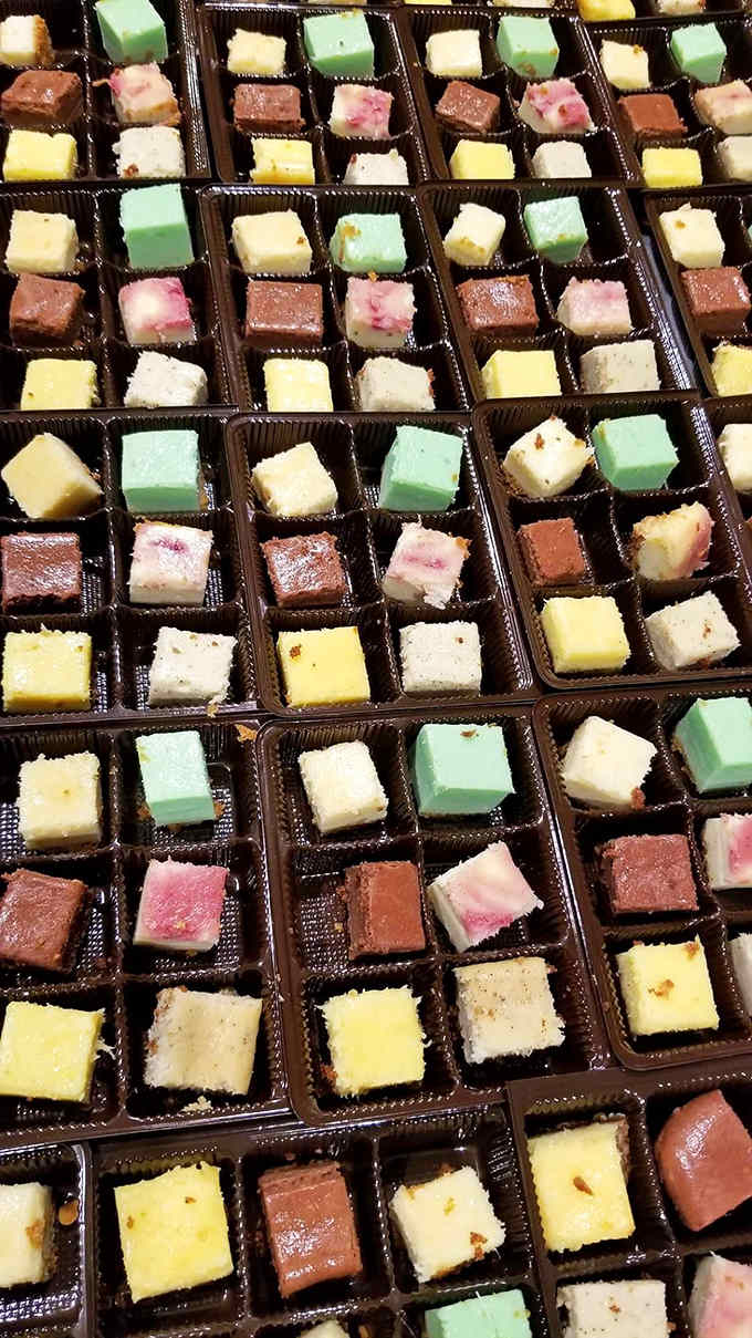 Tiny squares of joy arranged in chocolate boxes, these bite-sized cheesecake morsels solve the eternal problem of wanting to try everything.