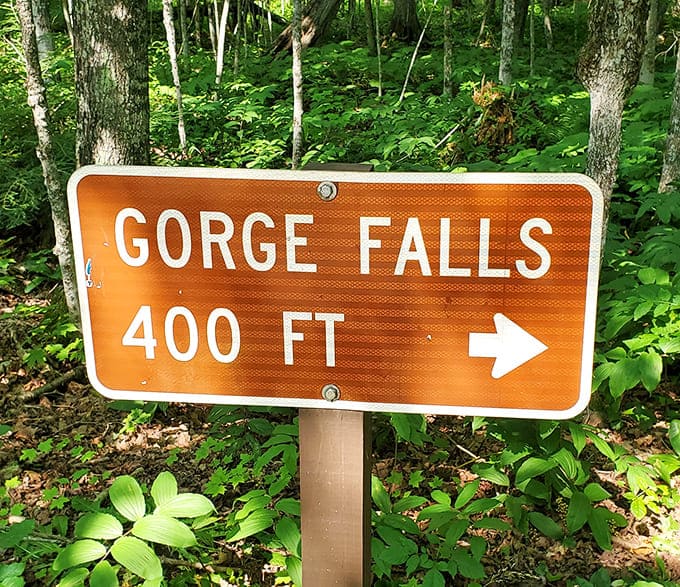 "Potawatomi Falls: 400 ft" promises the sign, but no words can prepare you for the natural spectacle waiting just around the bend.