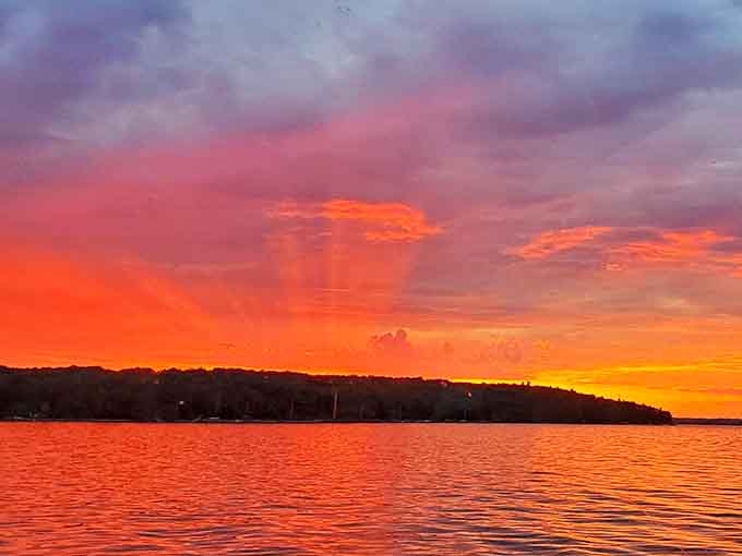 Mother Nature shows off at day's end, painting the sky in impossible colors that reflect perfectly in the still waters.