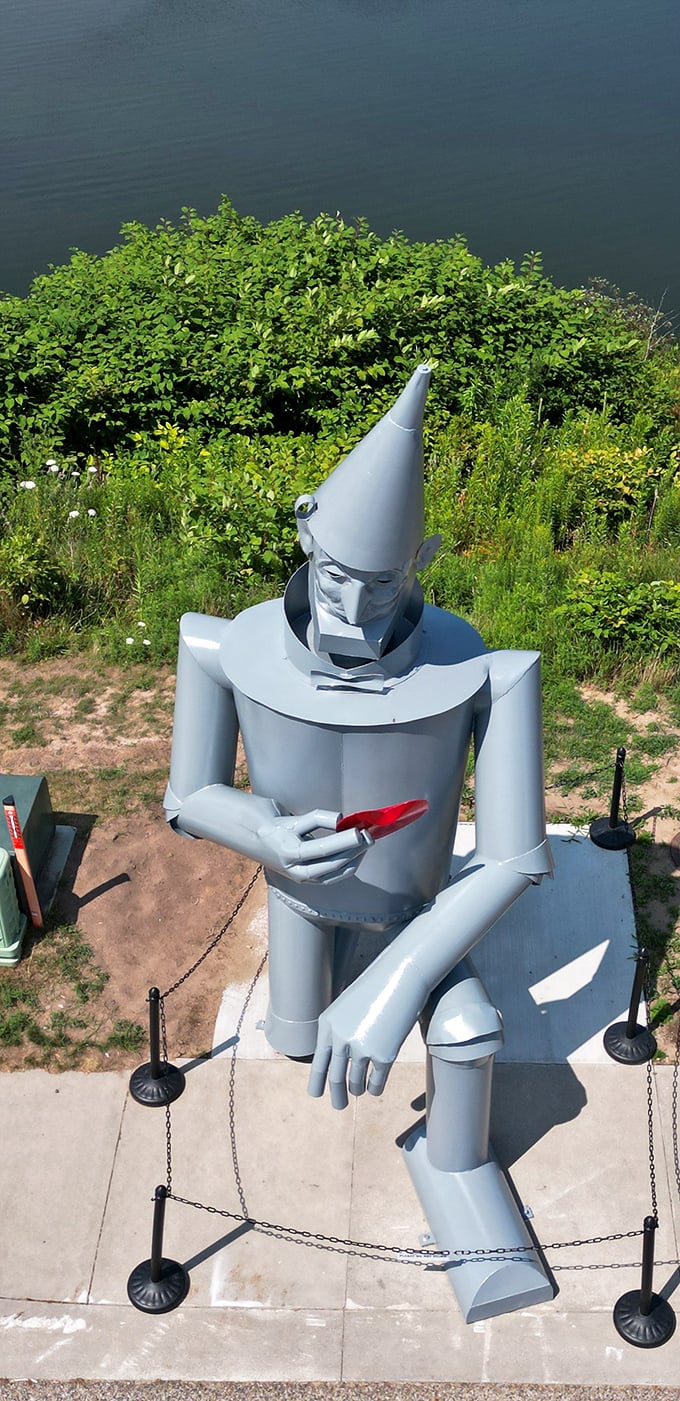 An aerial perspective shows how the Tin Man has become integrated into the landscape, standing watch over Hart Lake's peaceful waters.