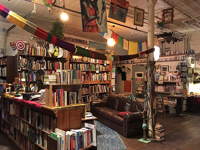 Colorful prayer flags dance overhead, adding a bohemian charm to this cathedral of literature and vinyl.