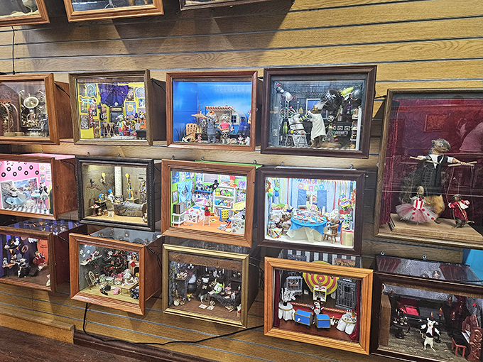 Each shadow box tells a different story, creating a neighborhood of miniature taxidermy tales stacked like apartment buildings.